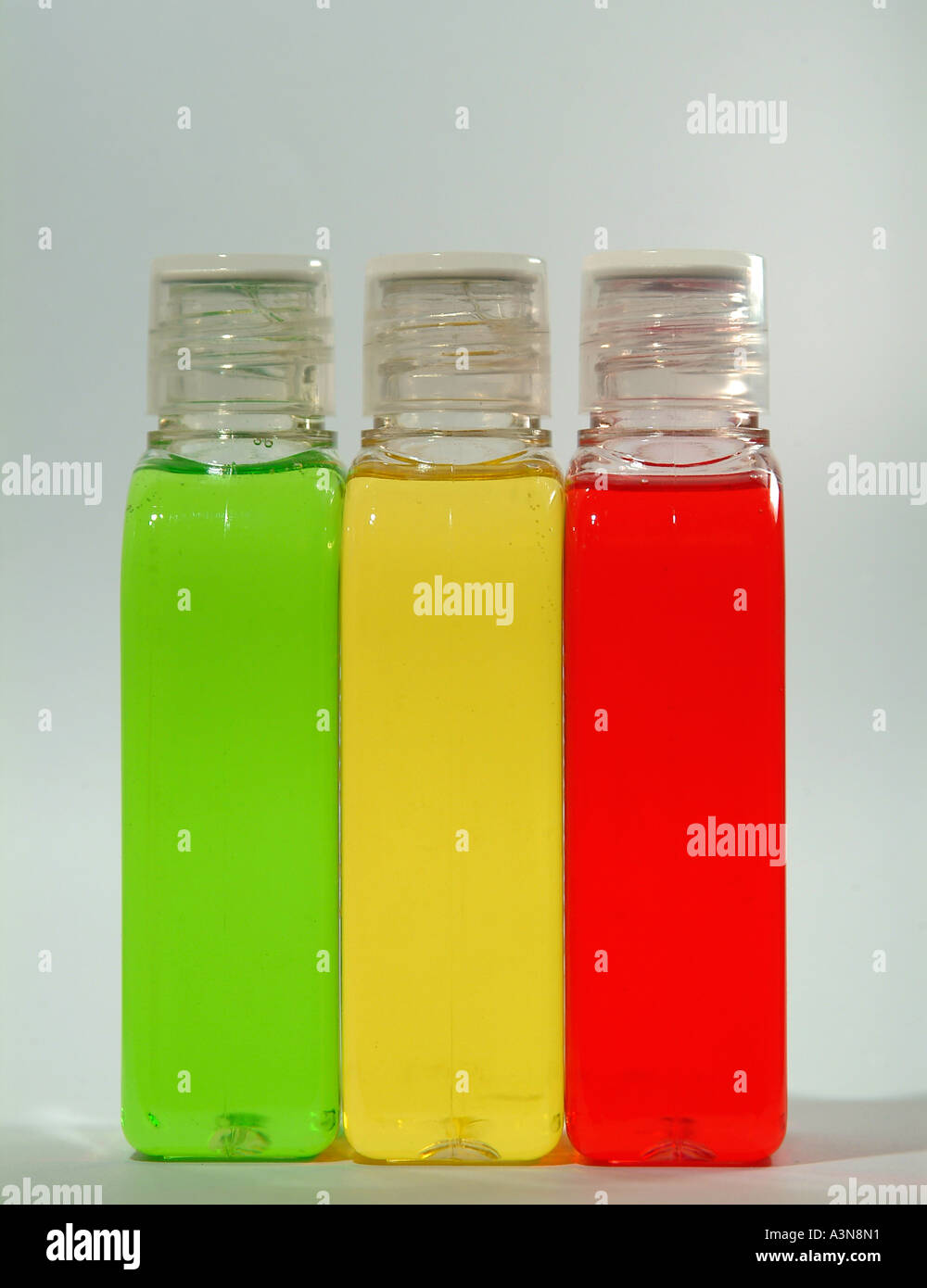 Bottles of multi coloured liquid Stock Photo - Alamy