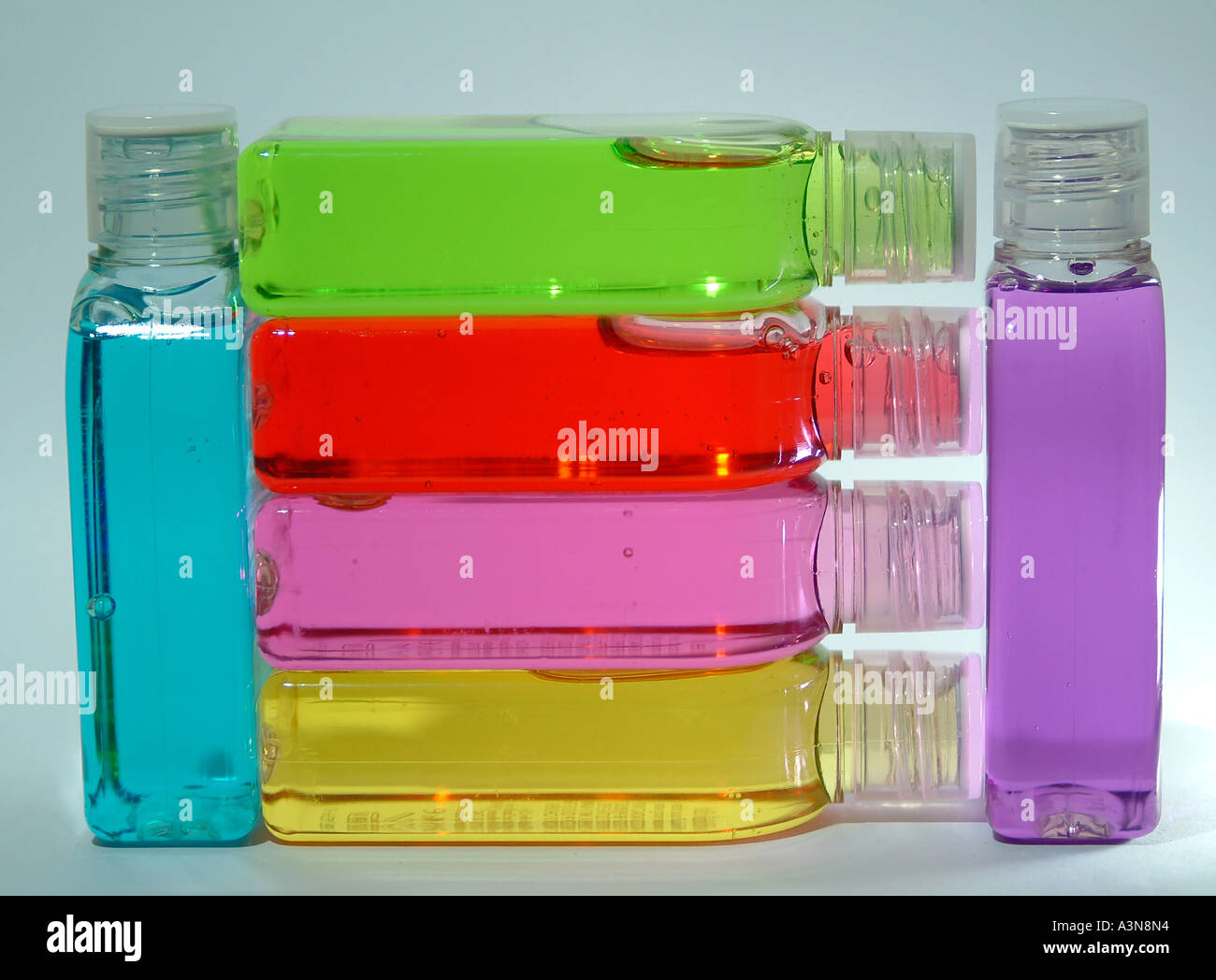 Bottles of multi coloured liquid Stock Photo - Alamy