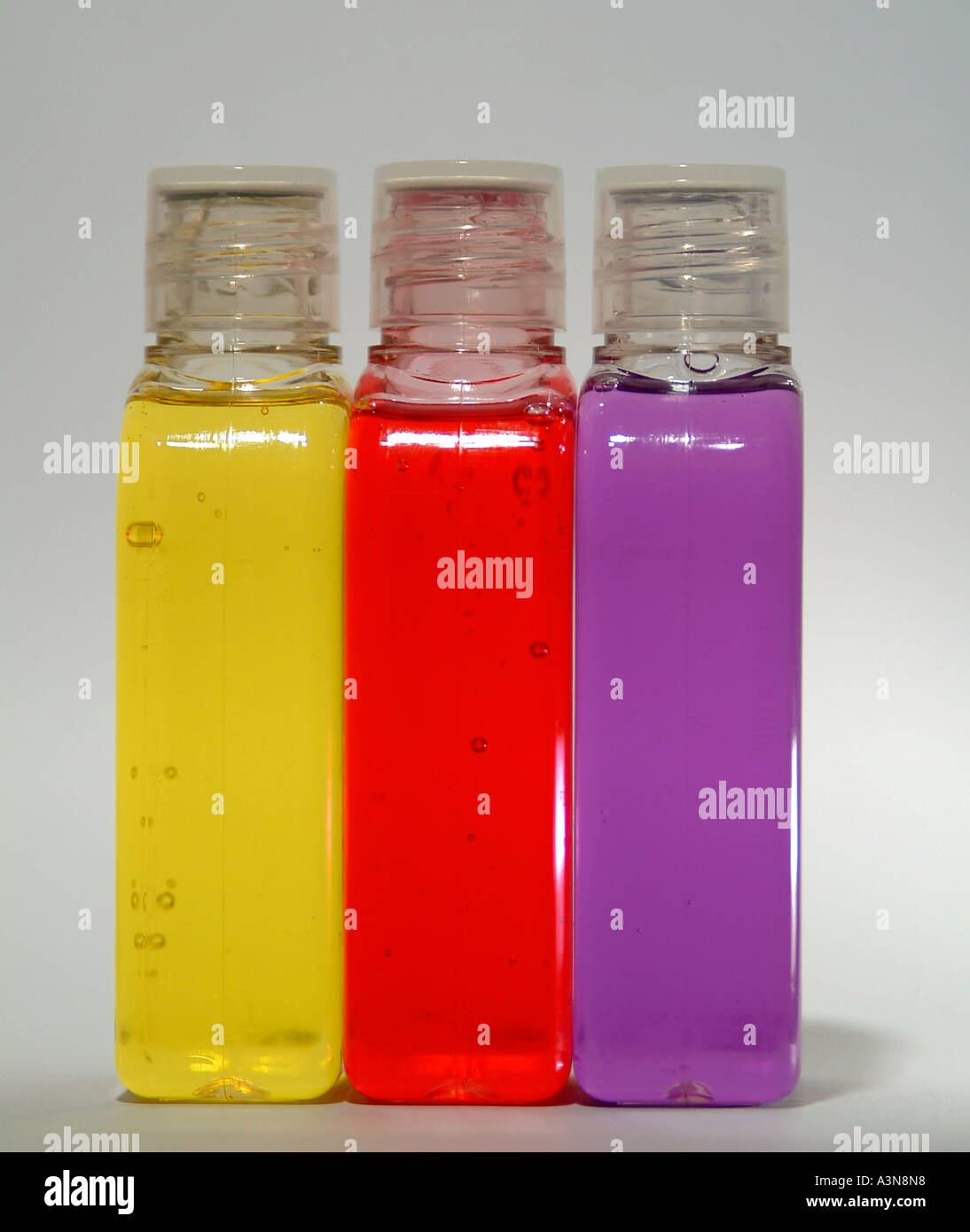 Bottles of multi coloured liquid Stock Photo - Alamy