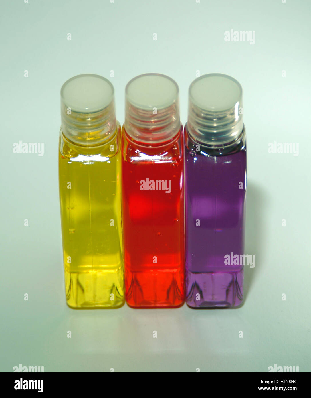 Bottles of multi coloured liquid Stock Photo - Alamy