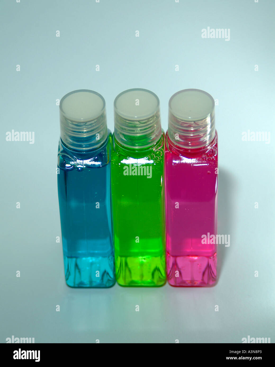 Bottles of multi coloured liquid Stock Photo - Alamy