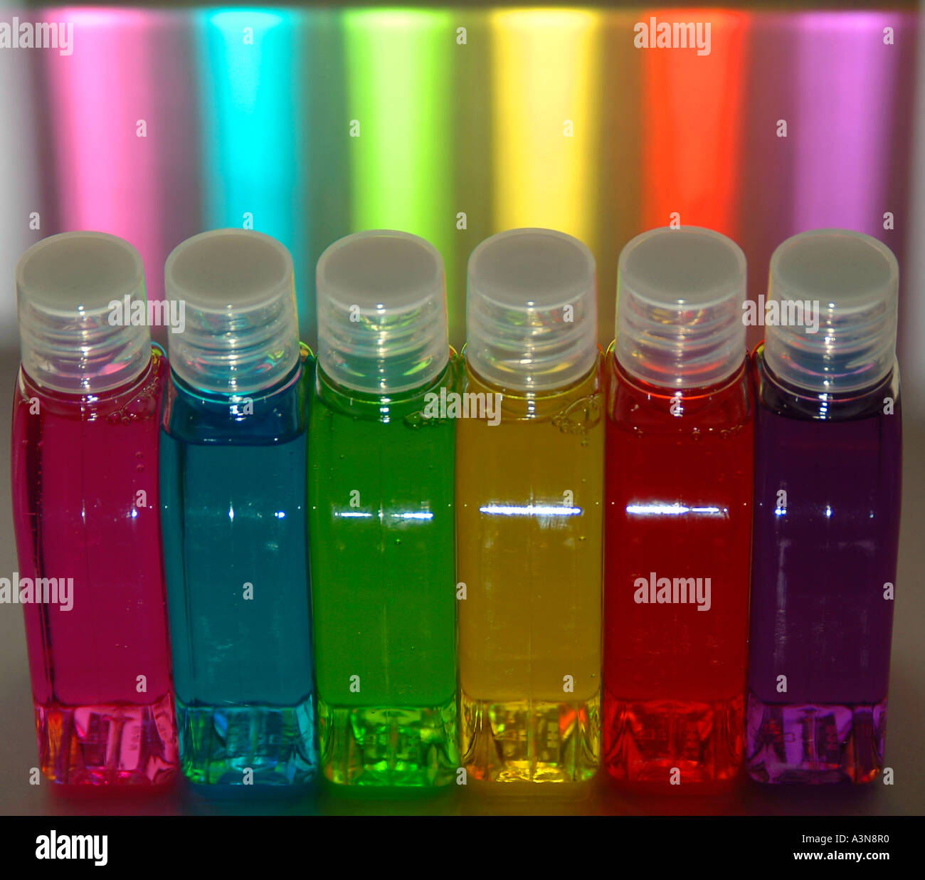 Bottles of multi coloured liquid Stock Photo - Alamy