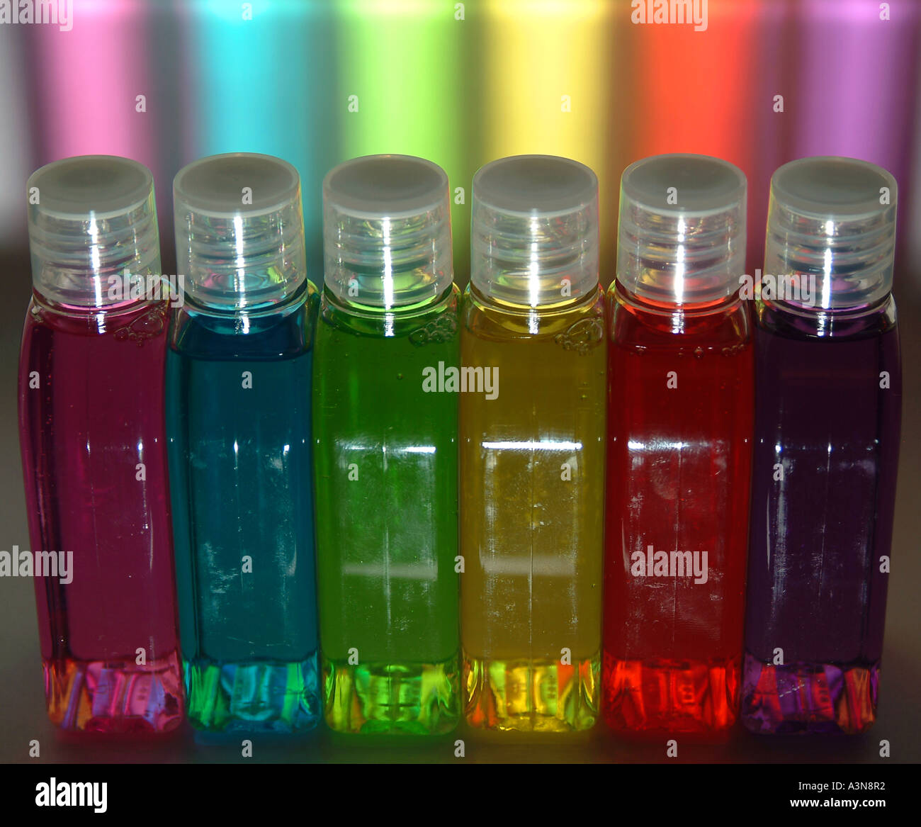 Bottles of multi coloured liquid Stock Photo - Alamy