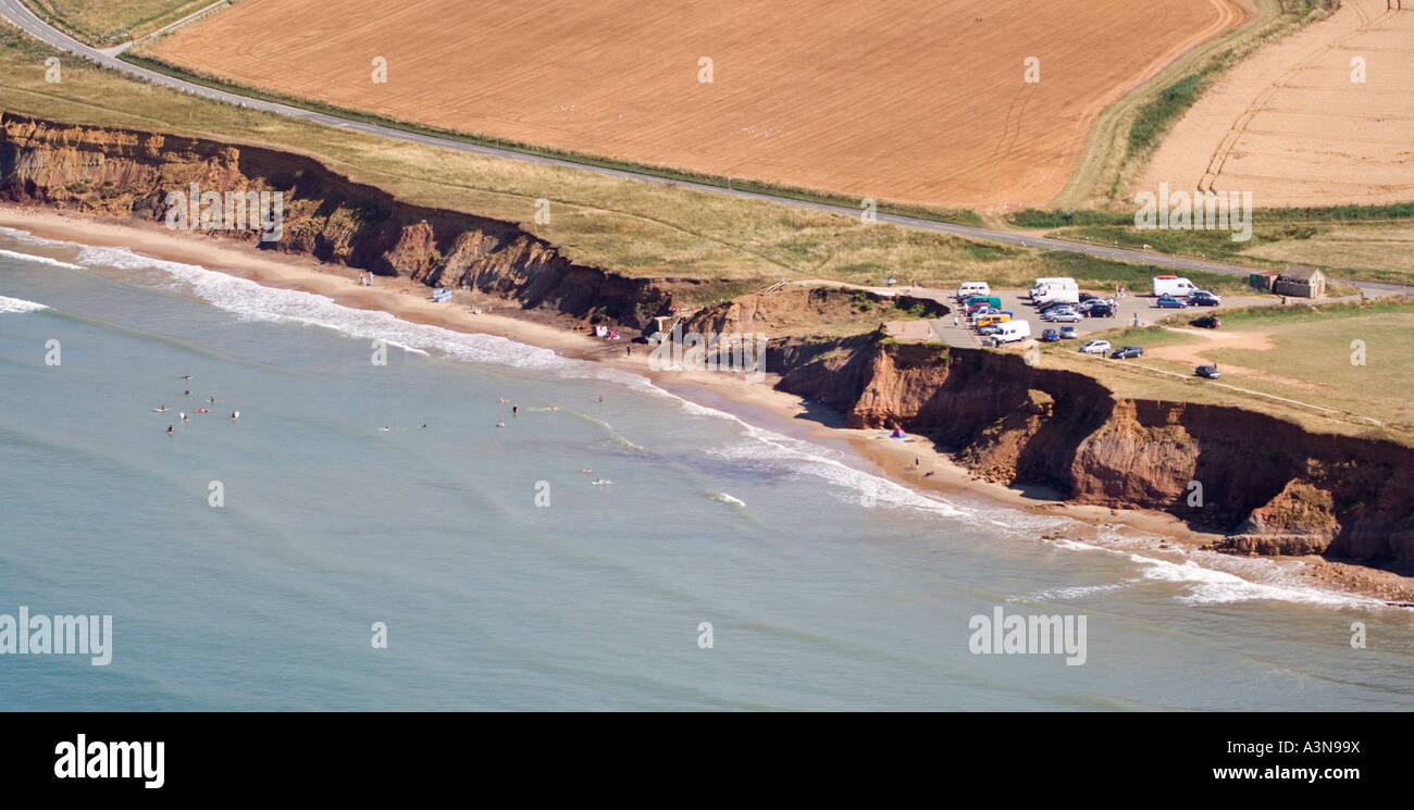 Aerial view of coastal erosion. Farm land and car park disappearing ...