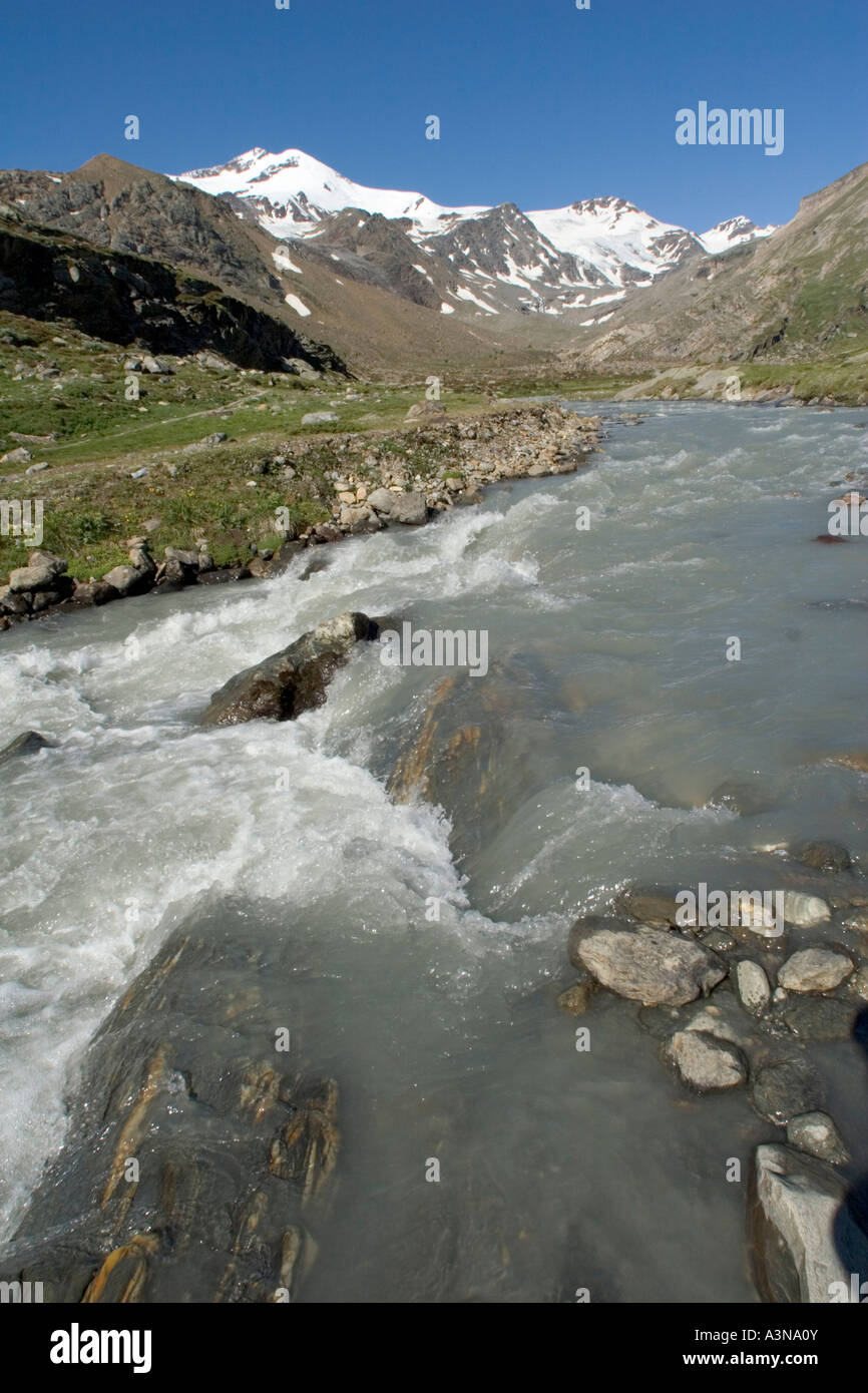 Plimabach river in upper Martell valley with the Cevedale glacier in ...