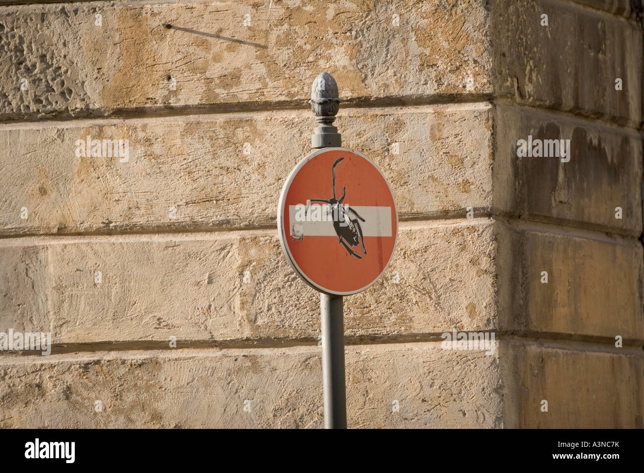 No entry sign with cockroach design, Italy Stock Photo - Alamy