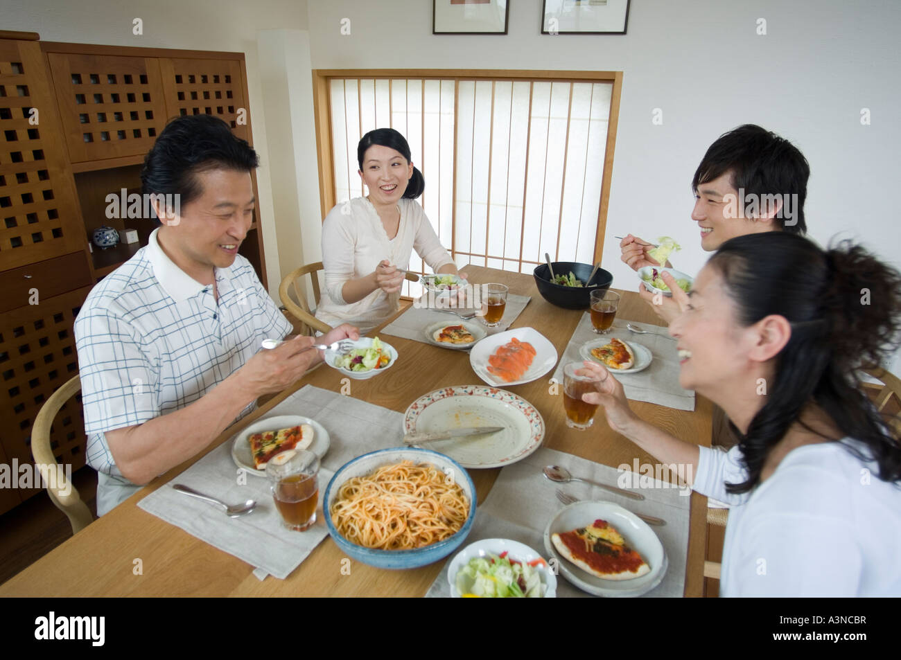 Black family sitting dining room hi-res stock photography and images ...