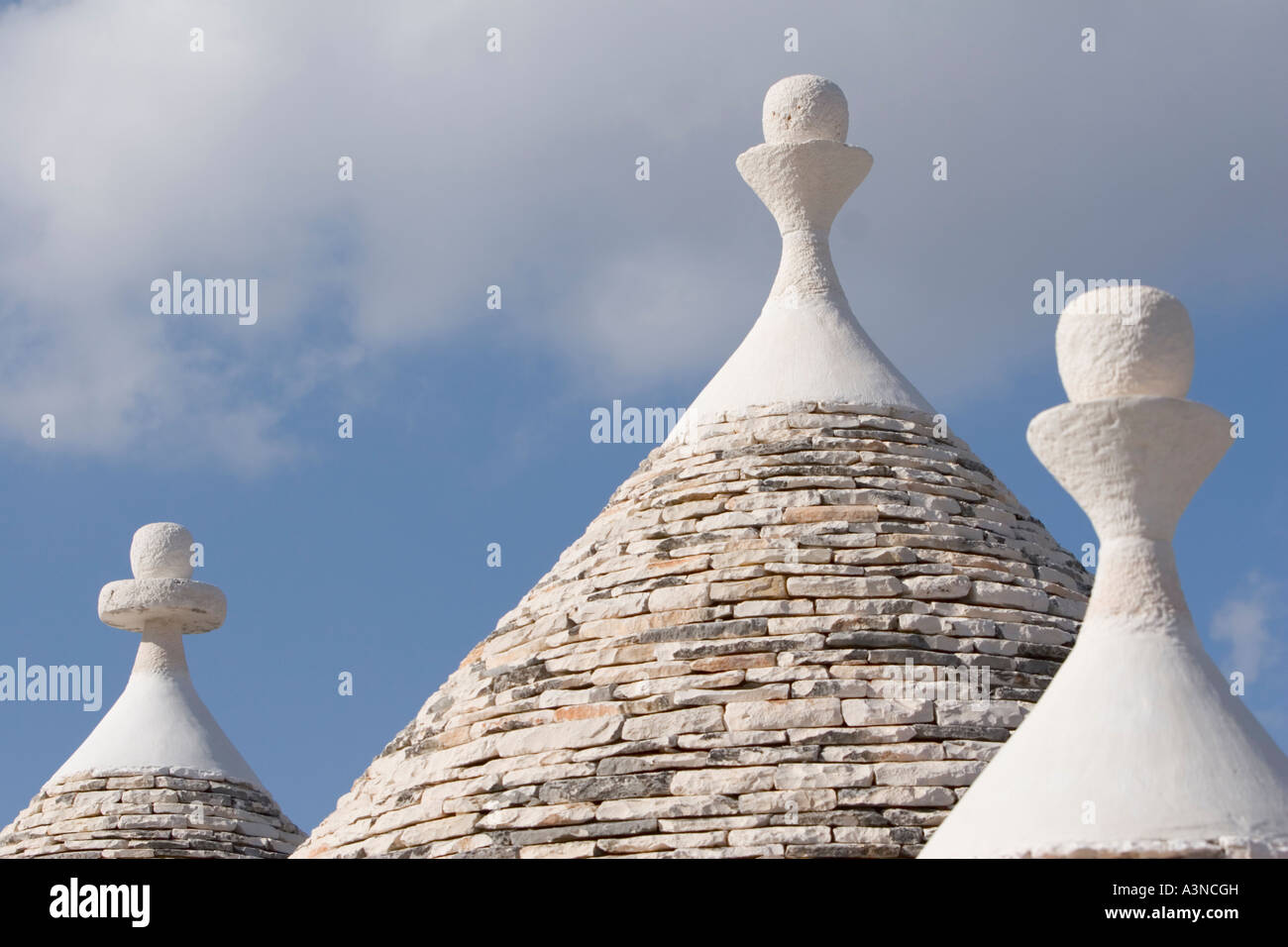 Traditional designs on the top of trulli houses, Alberobello, Puglia ...