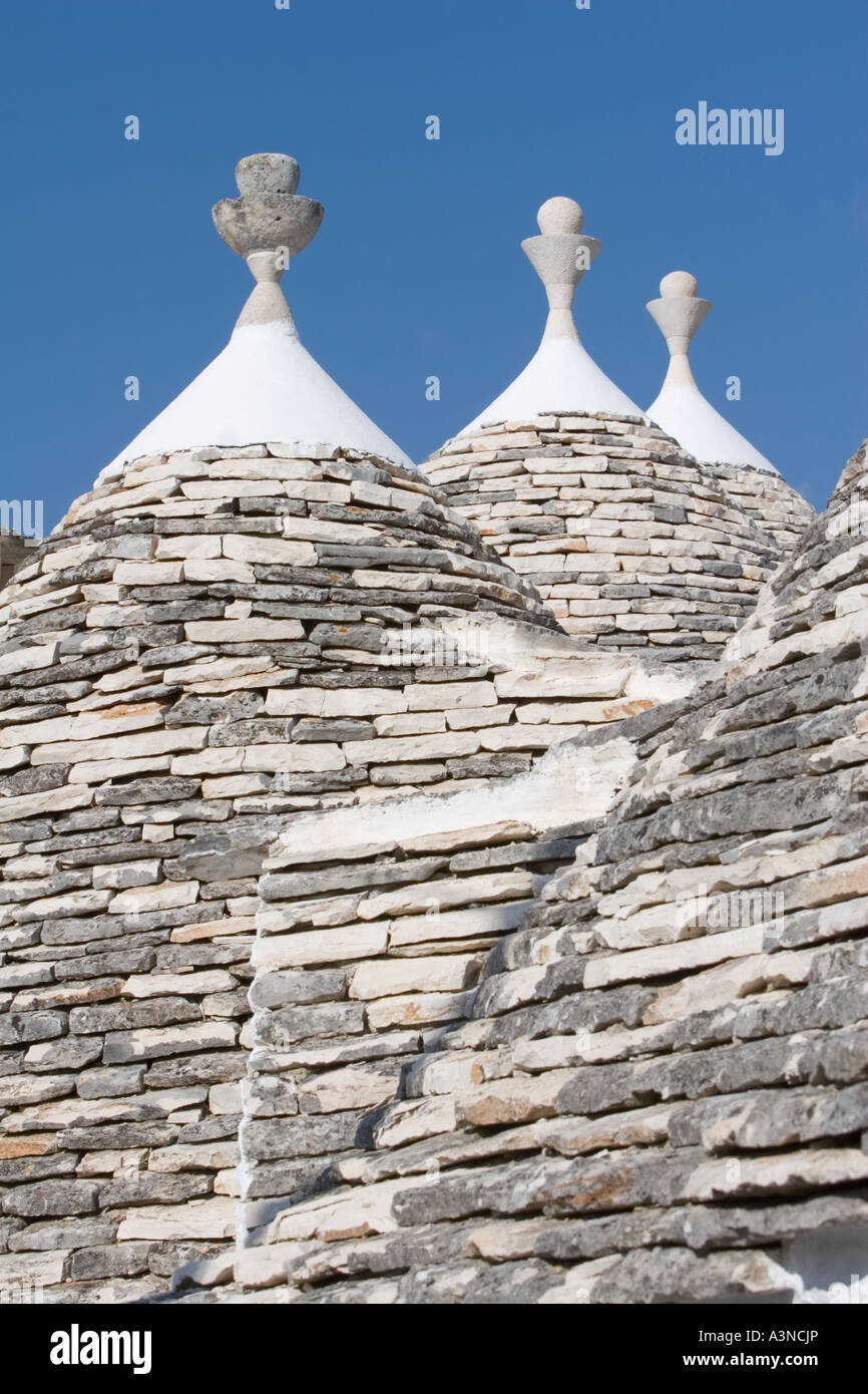 Traditional designs on the top of trulli houses, Alberobello, Puglia ...