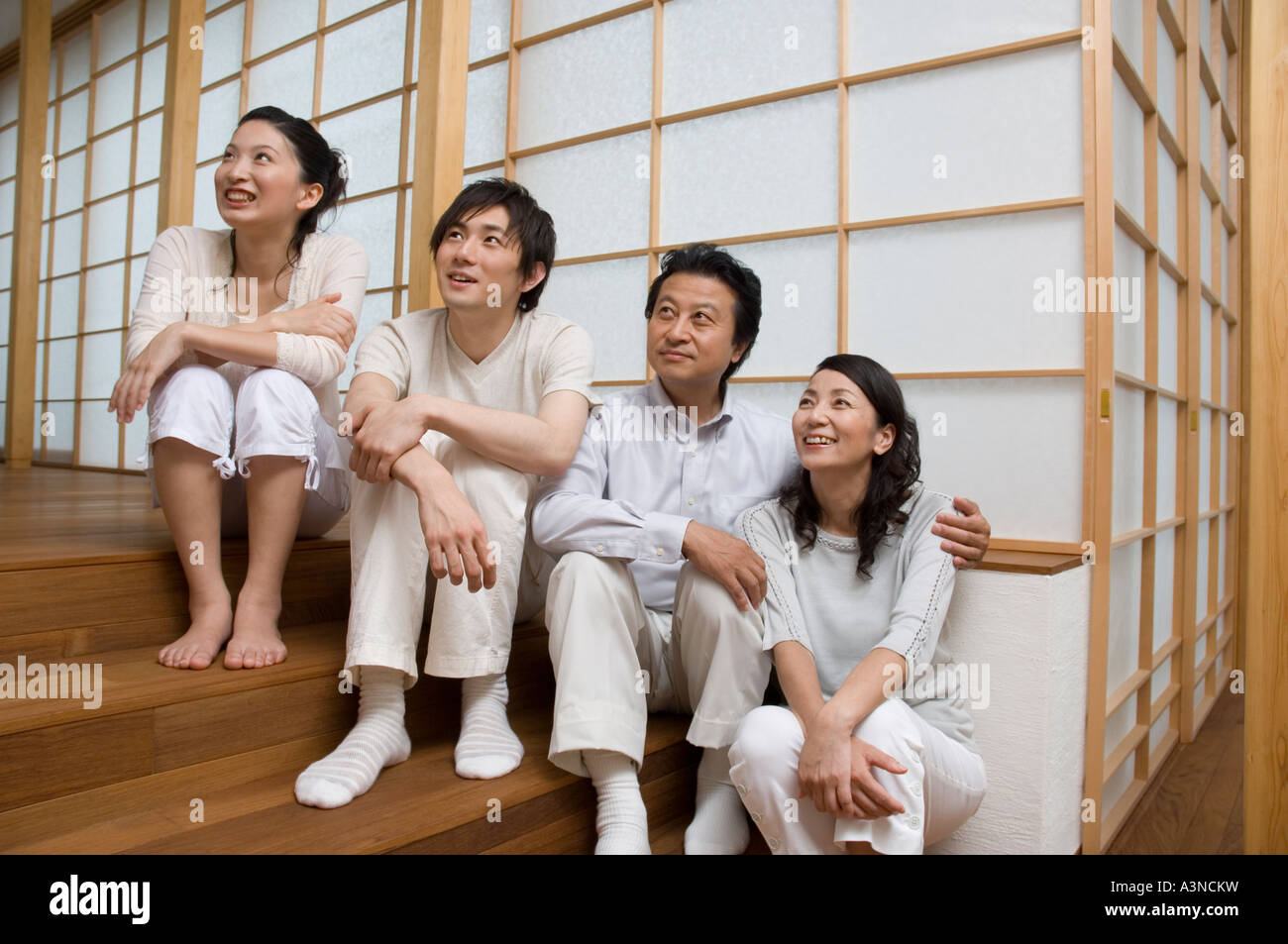 Portrait of a family with adult children Stock Photo - Alamy