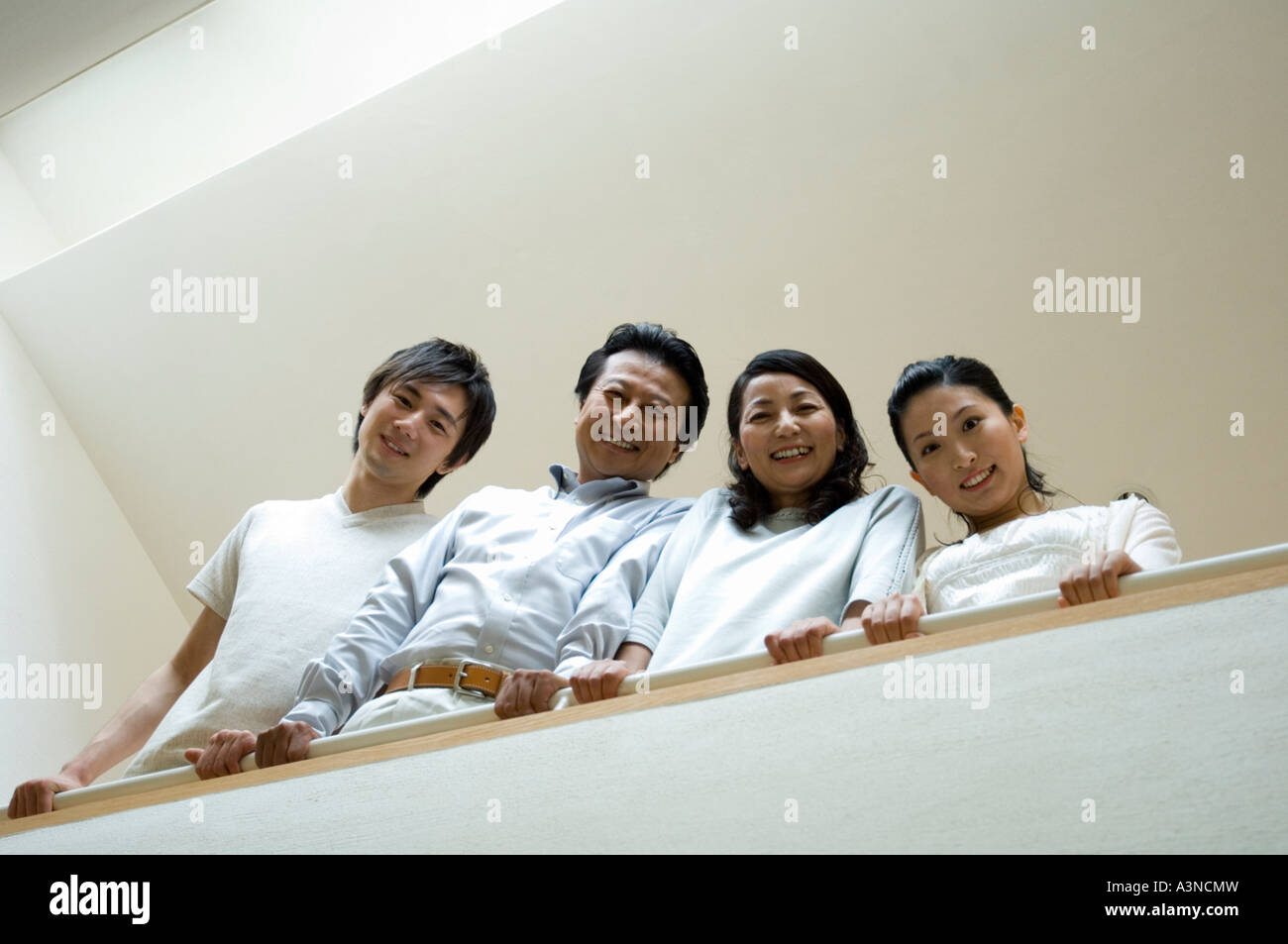 Portrait of a family with adult children Stock Photo - Alamy