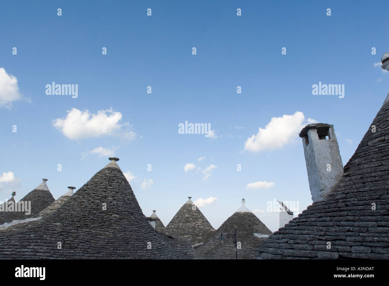 Joined rooves of tulli houses in Alberobello, Puglia, Italy Stock Photo ...