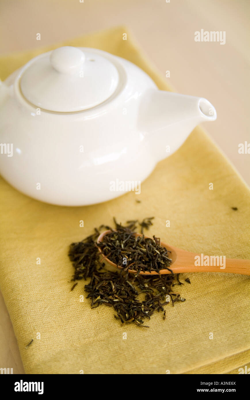 Tea leaves and teapot Stock Photo - Alamy