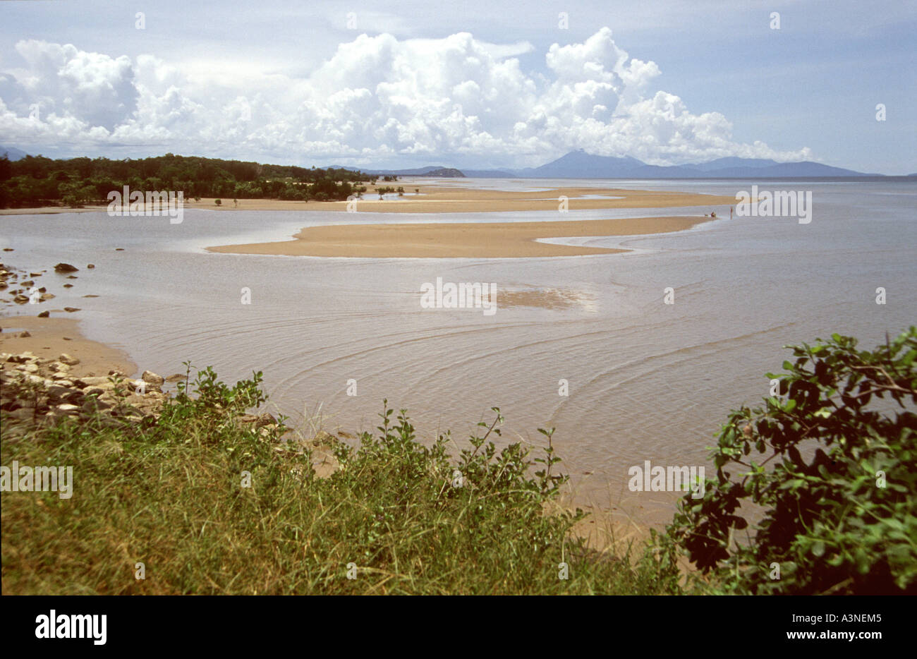 Isolated golden sandy beach with sand bars Yule Point Qld Australia ...