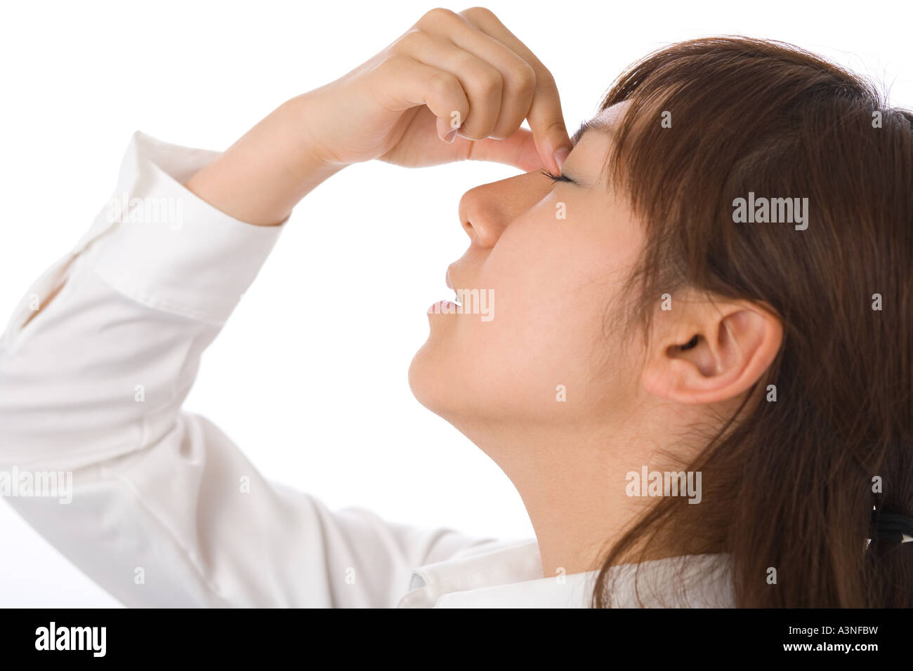 A young woman closing eyes Stock Photo - Alamy