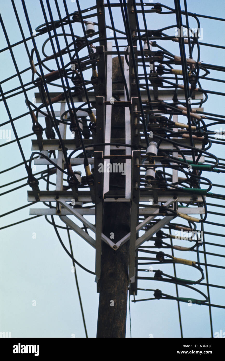 Loaded telephone pole Stock Photo - Alamy