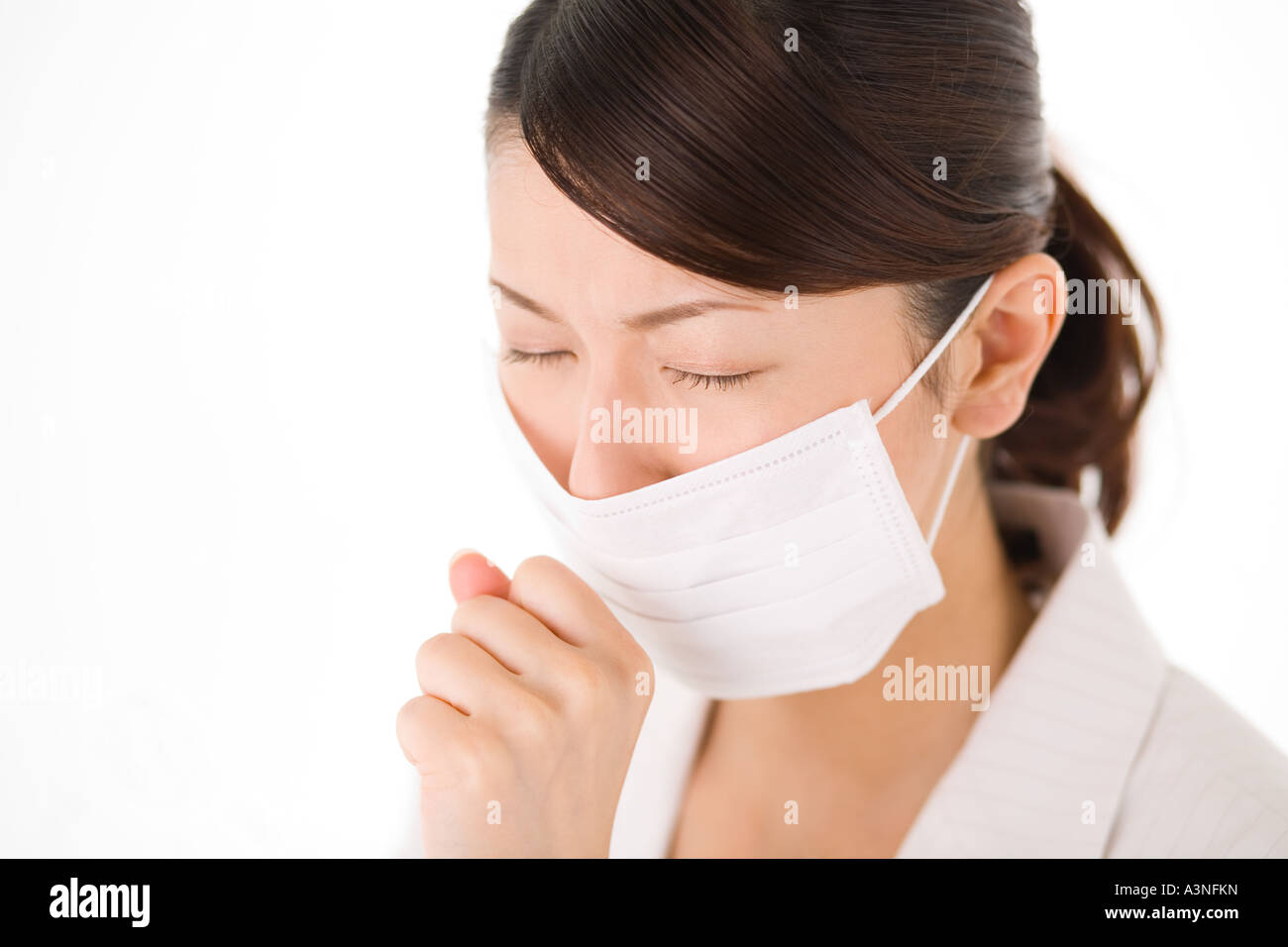 Young woman coughing Stock Photo - Alamy