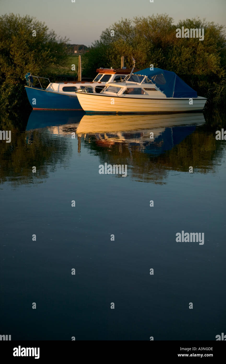 Boats tied up along bank of the Ribe River Ribe Jutland Denmark Stock ...