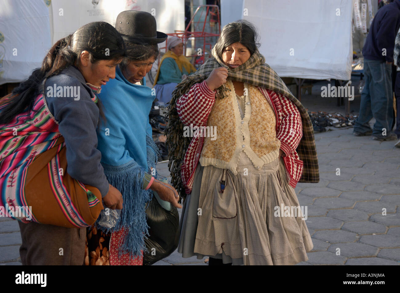 Aymara Indians in a market place in Uyuni town in The Andes, Bolivia ...