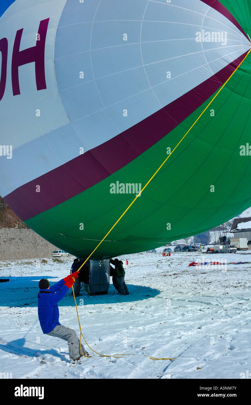 Man holding the mooring line of an airship Stock Photo - Alamy