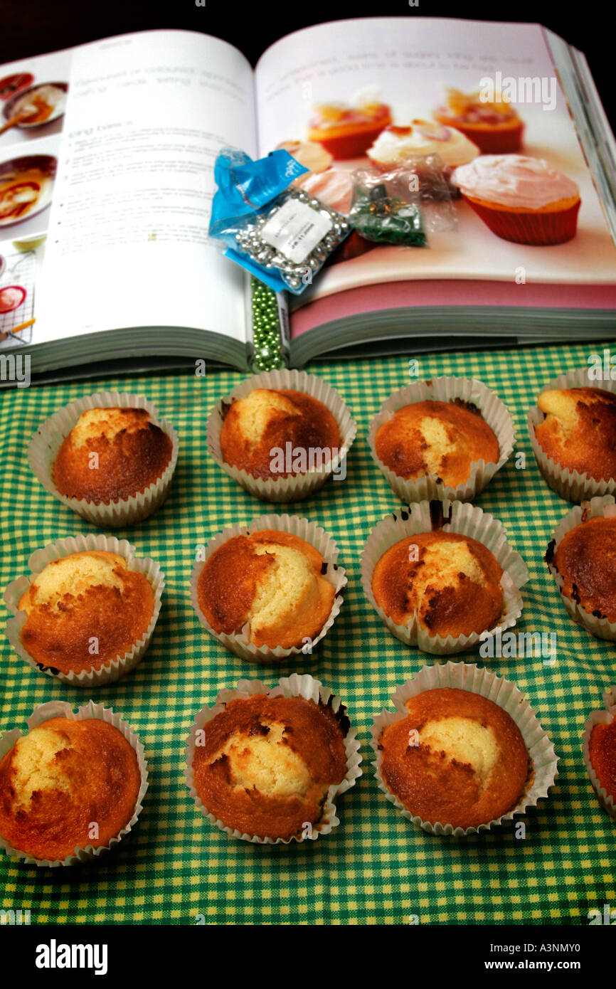 Making cupcakes with recipe book Stock Photo - Alamy