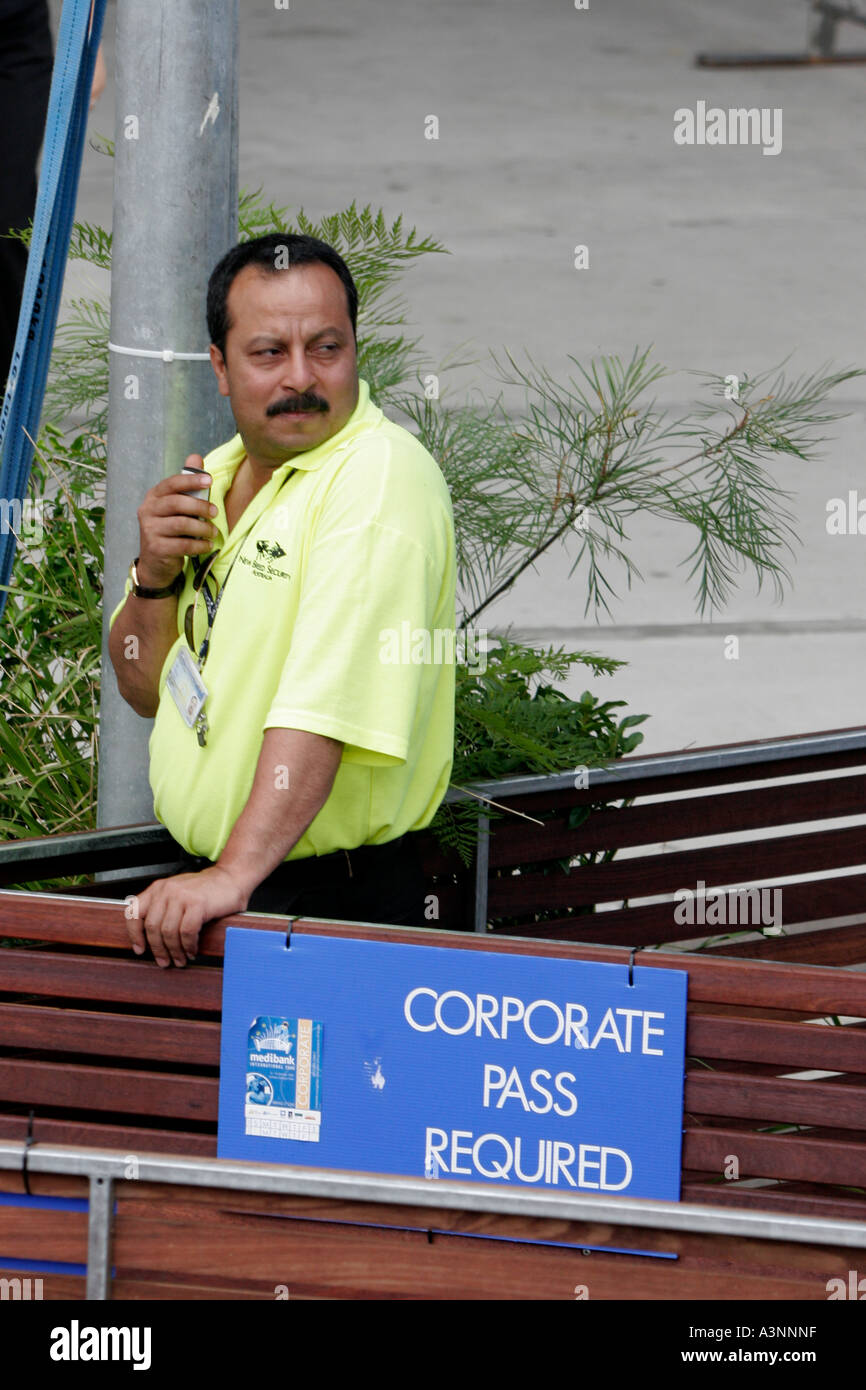 A security guard at a private corporate party Stock Photo - Alamy