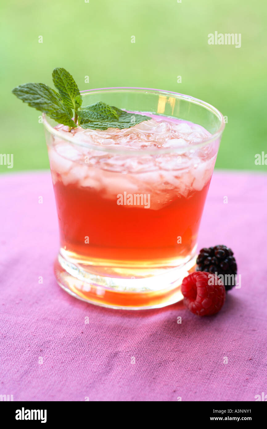Glass of Berry Iced Tea Outdoors Stock Photo - Alamy