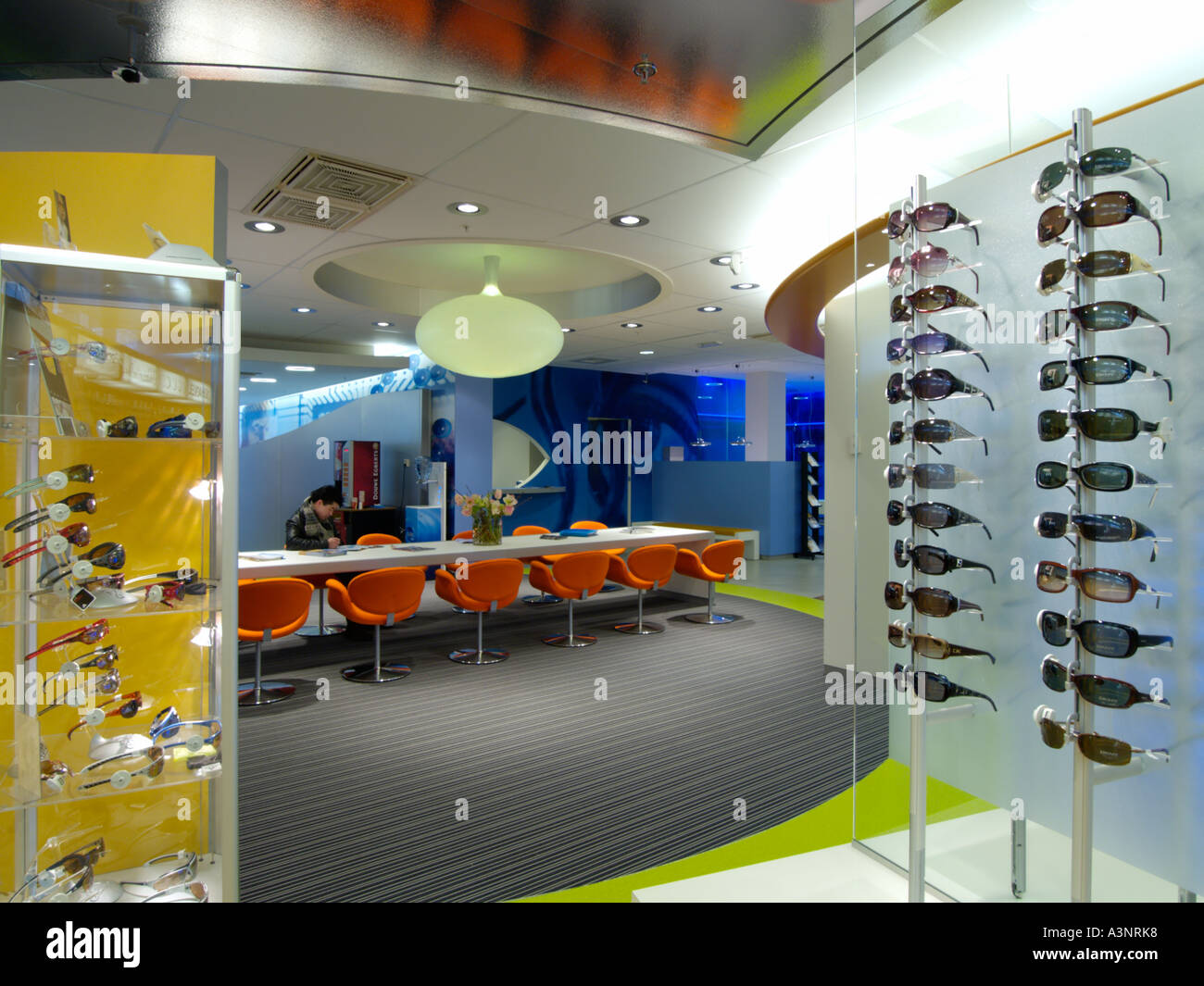 Optician modern shop store interior Rotterdam the Netherlands with man ...