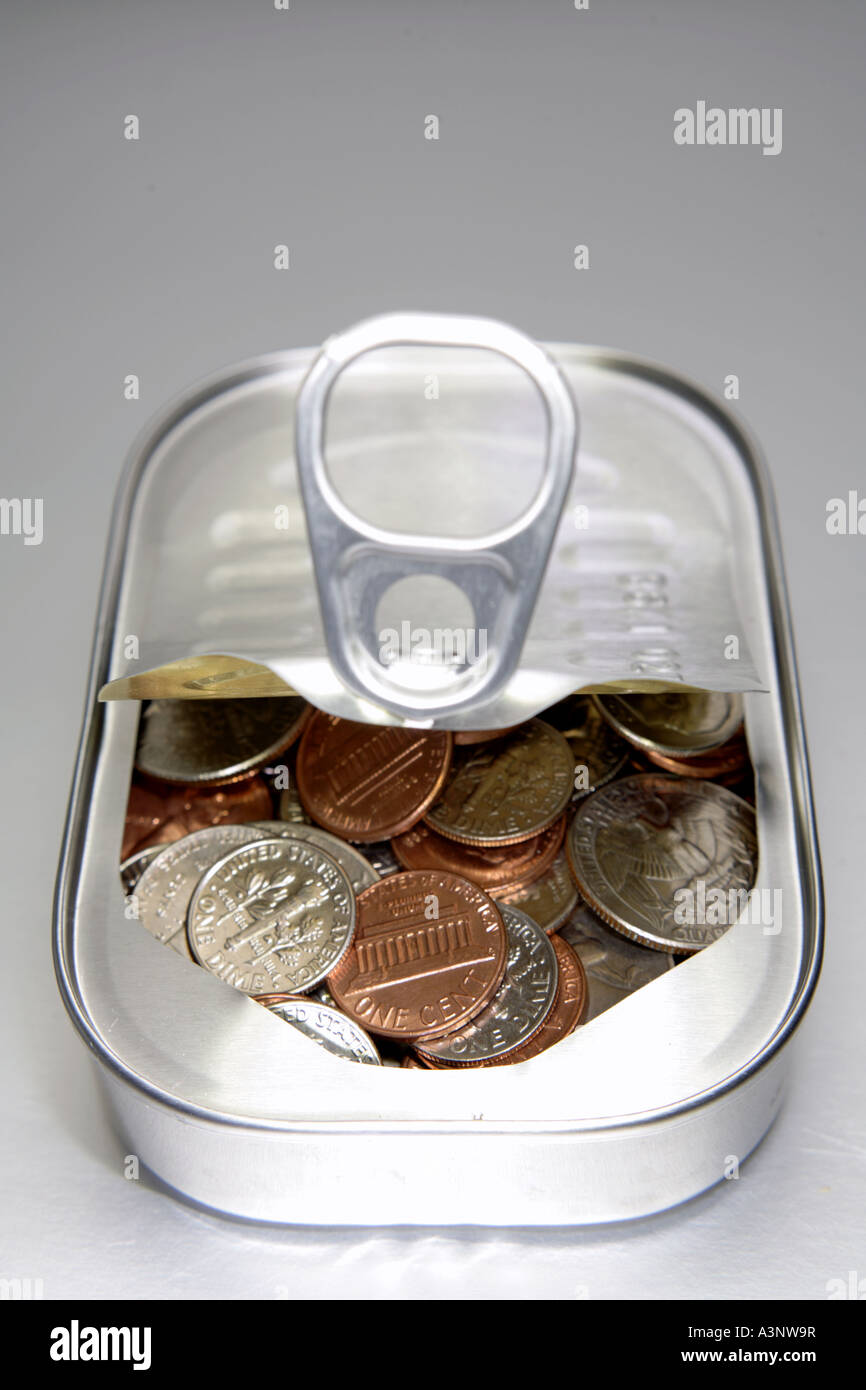 Coins in tin Stock Photo - Alamy