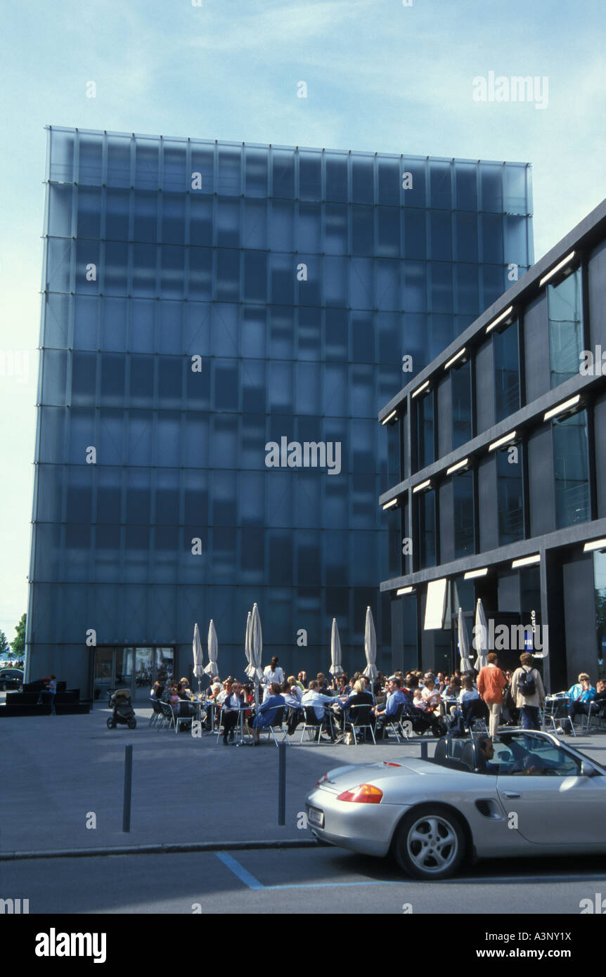 People at the caf of the Kunsthaus Bregenz museum in front of the ...