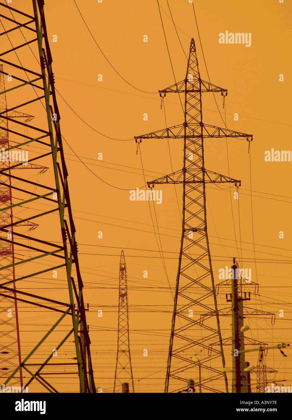 power transmission line power pole yellow background Stock Photo - Alamy