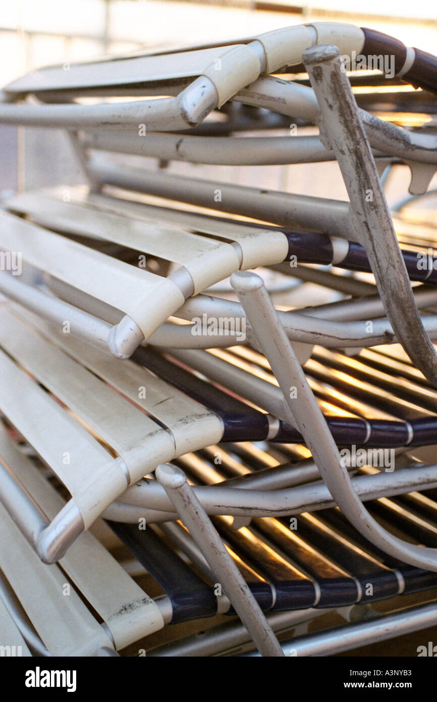 Stacked deck chairs hi-res stock photography and images - Alamy