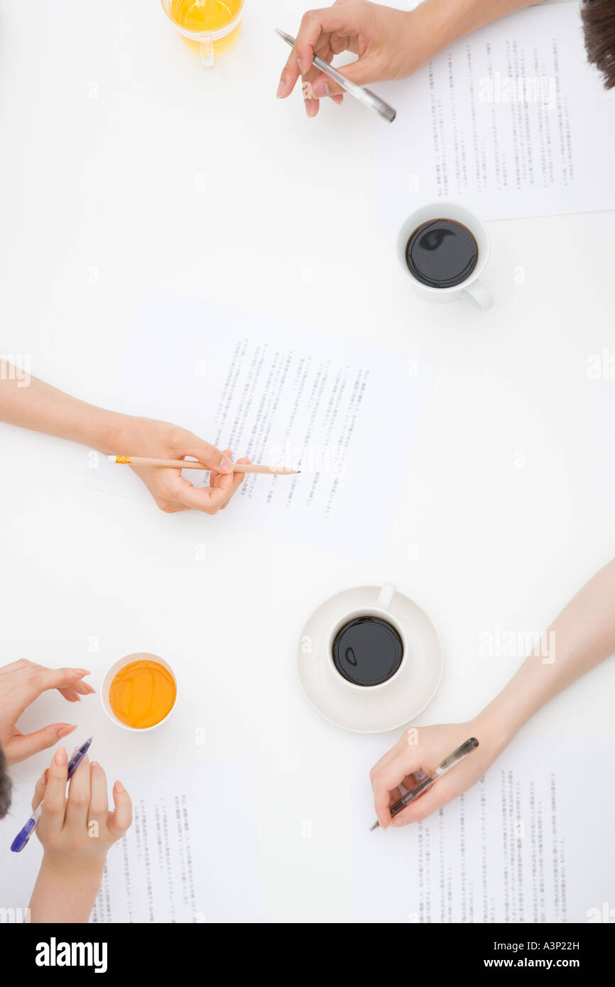Hands of people meeting at desk Stock Photo - Alamy