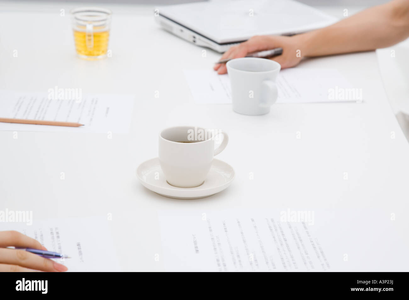 People's hands on meeting table Stock Photo - Alamy