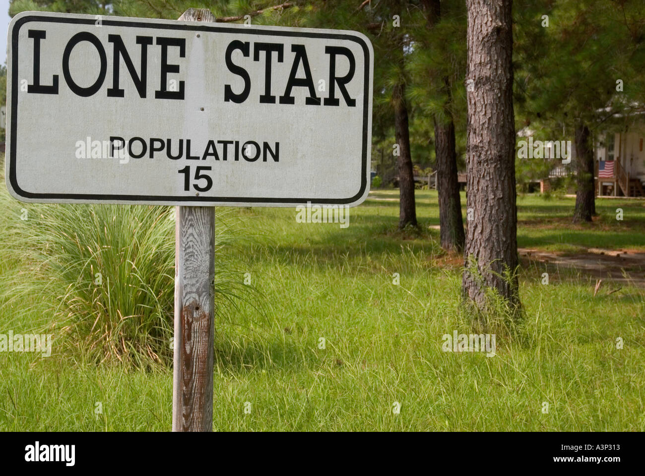Lone Star population 15 sign along a rural road in South Carolina, USA ...