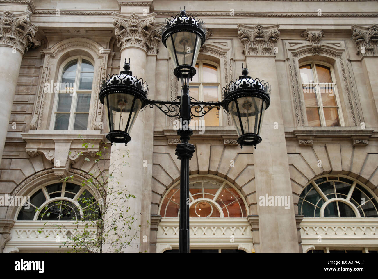 Ornate streetlamps and facade Royal Exchange City of London England ...