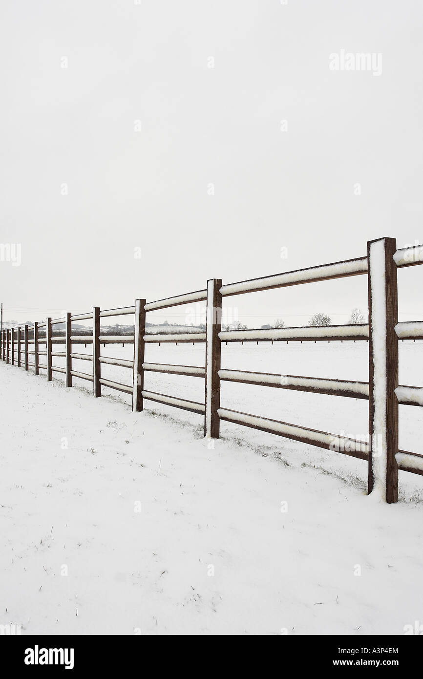wooden fence in snow Stock Photo - Alamy