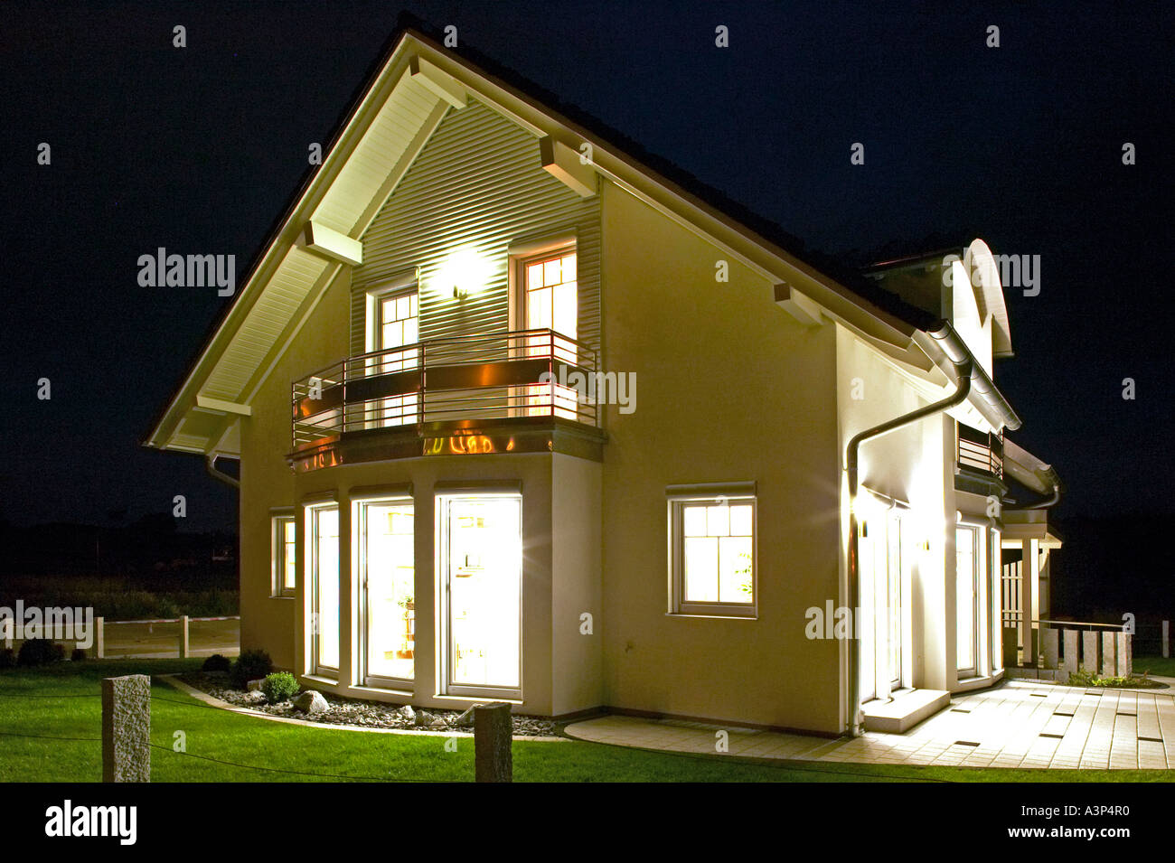 illuminated house at night Stock Photo - Alamy