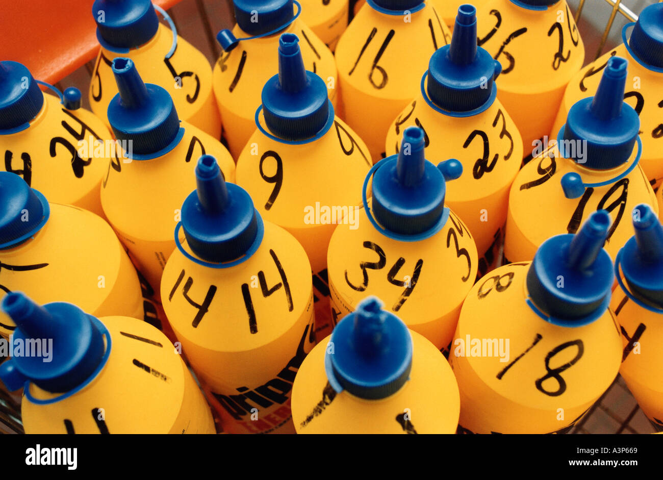 Numbered sport bottle with water Stock Photo - Alamy