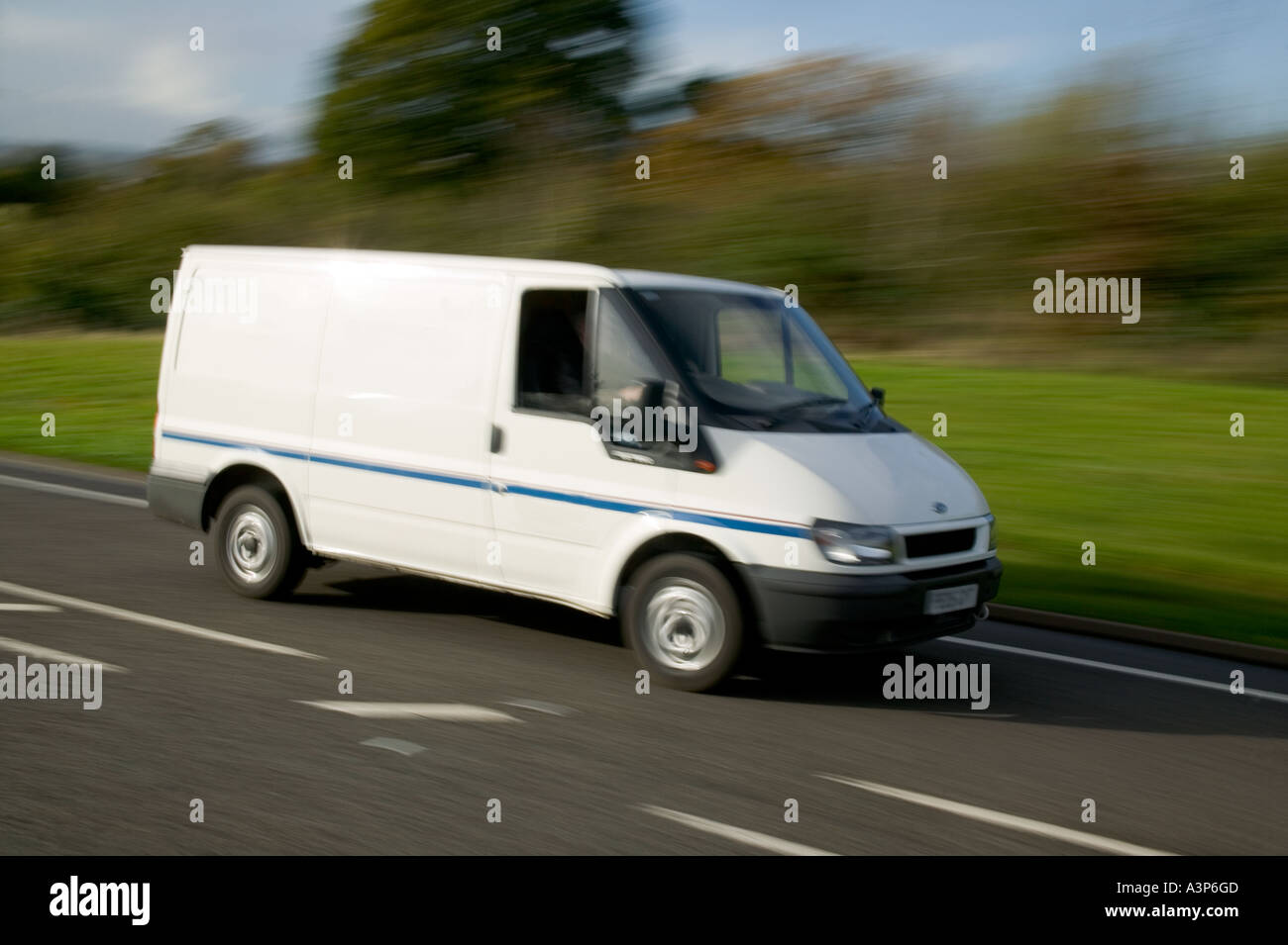 WHITE DELIVERY VAN ON COUNTRY ROAD UK Stock Photo - Alamy