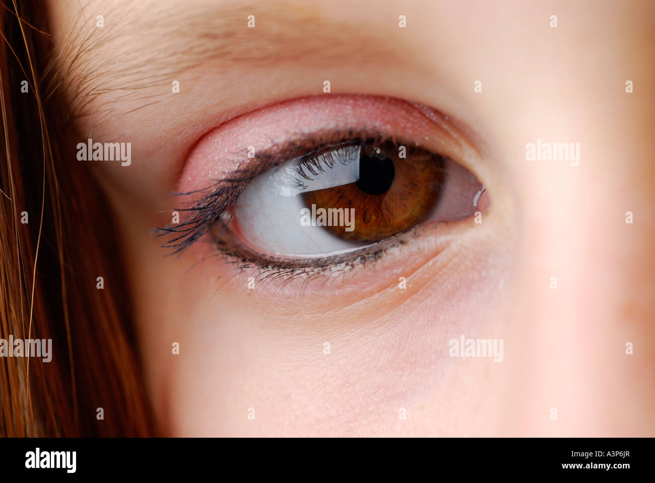 Close up eye of teenage girl Stock Photo - Alamy