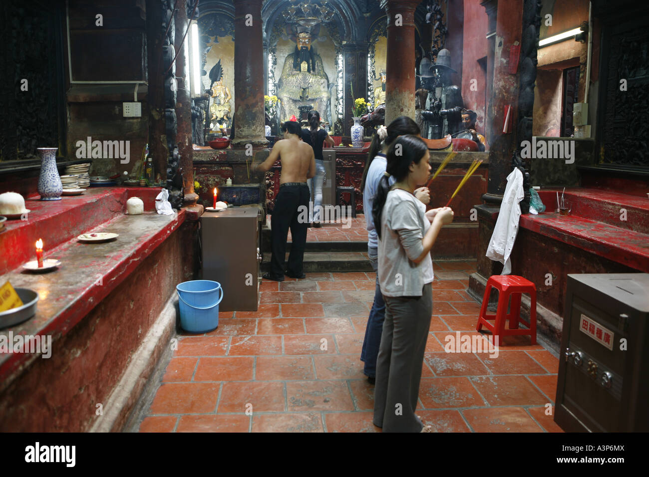 Praying youngsters in Buddhist temple in Hoi Chi Minh City (Vietnam ...