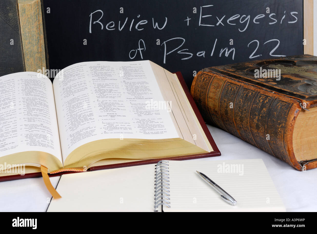 Bible study Homework with large books and blackboard Stock Photo - Alamy
