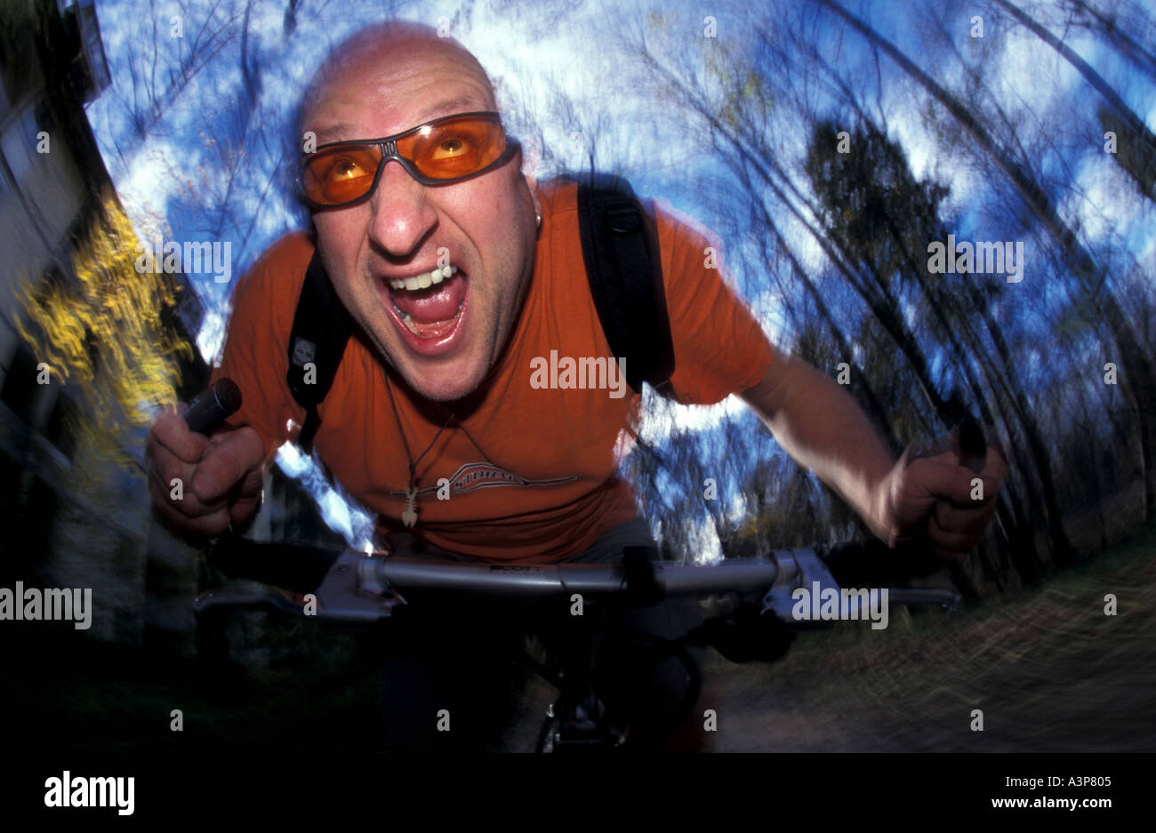 Man riding bicycle Stock Photo - Alamy