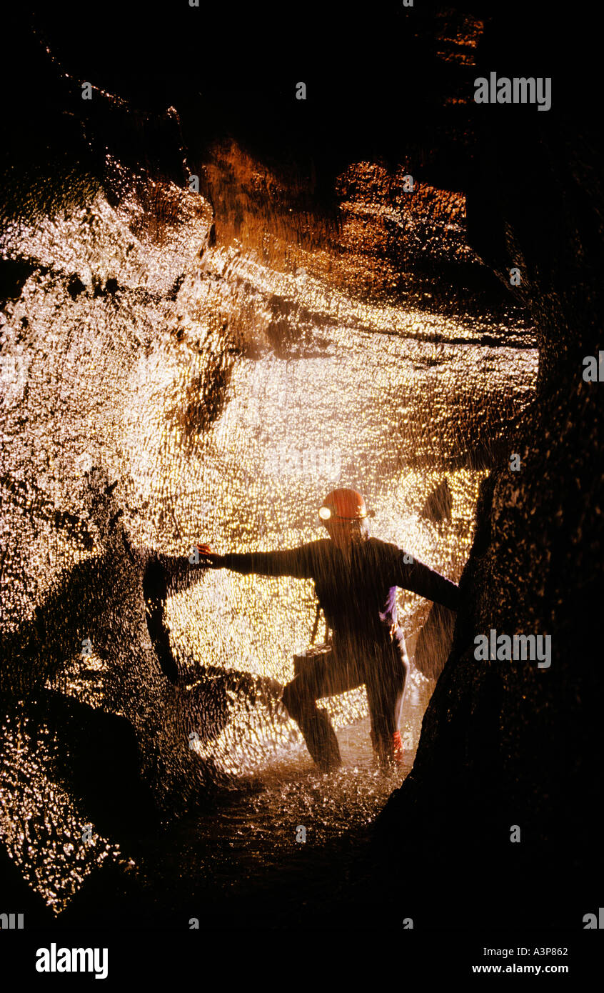 Female caver in a streamway in a South Wales cave UK Stock Photo - Alamy