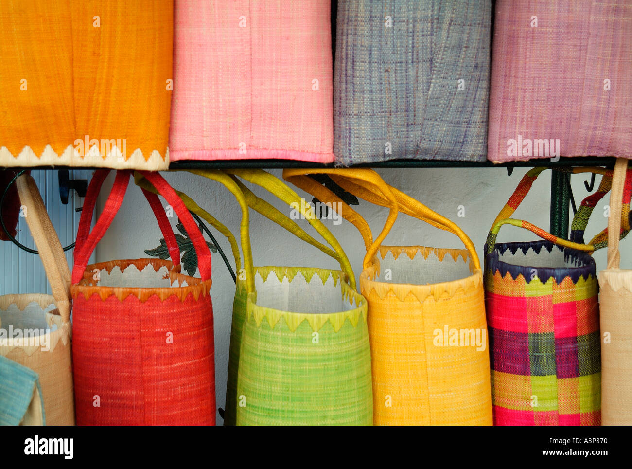 row of colourful raffia bags Stock Photo - Alamy