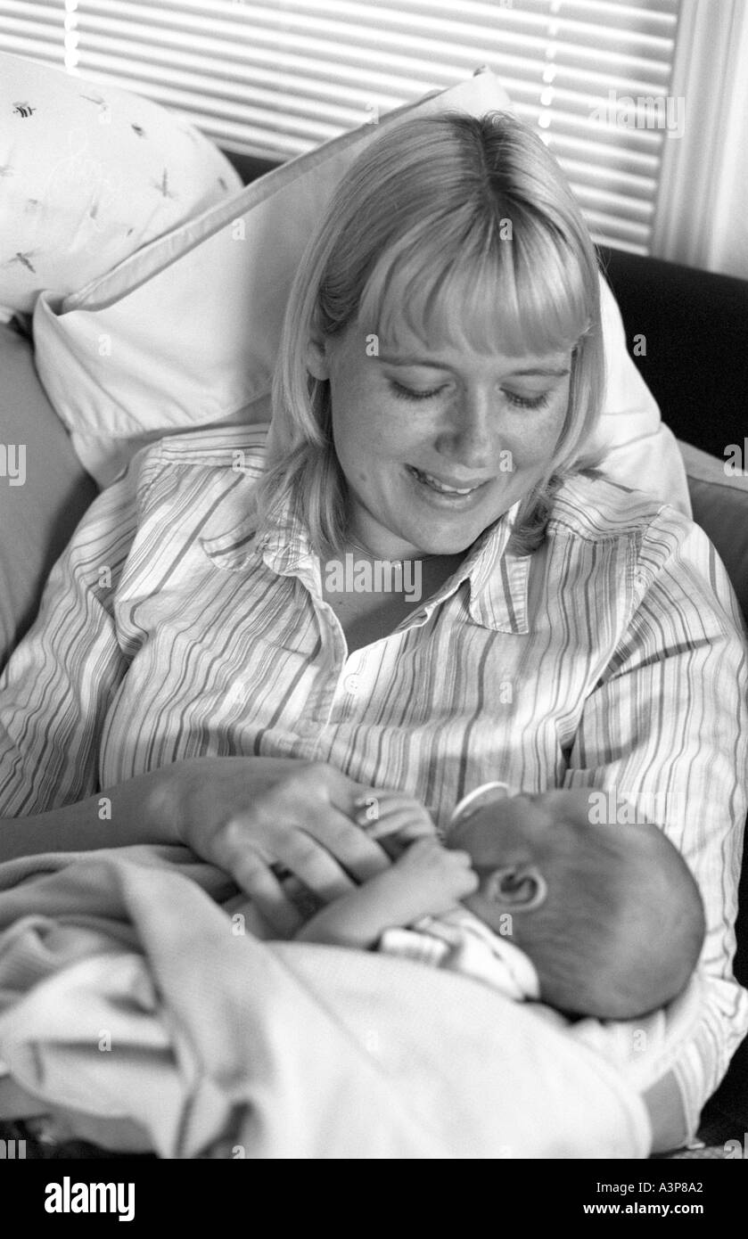Mother holding newborn baby Stock Photo - Alamy Mother holding newborn baby Stock Photo - Alamy