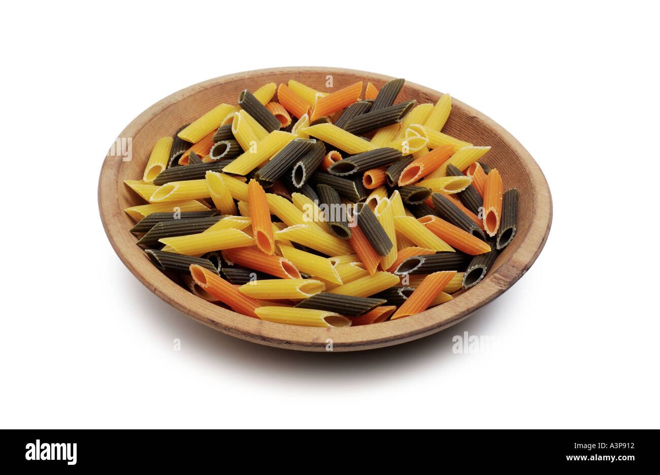 Bowl of tricolored penne pasta Stock Photo - Alamy