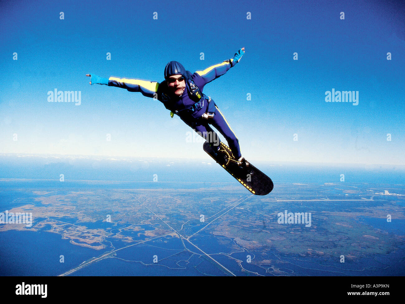 sky surfing flying through the air on a board Stock Photo - Alamy
