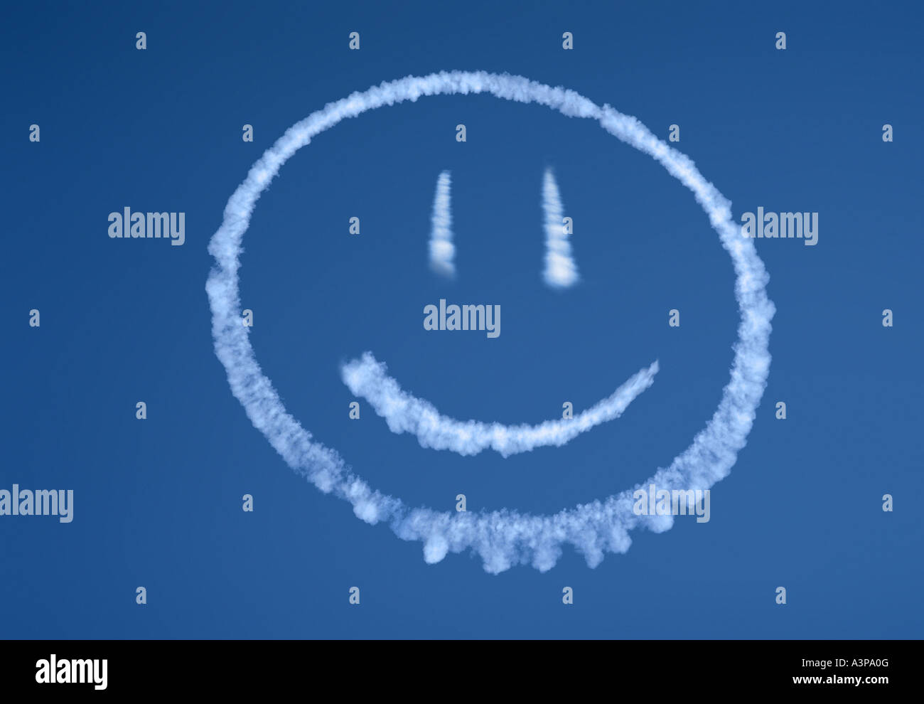 Smiley face in smoke trail from skywriting Stock Photo - Alamy